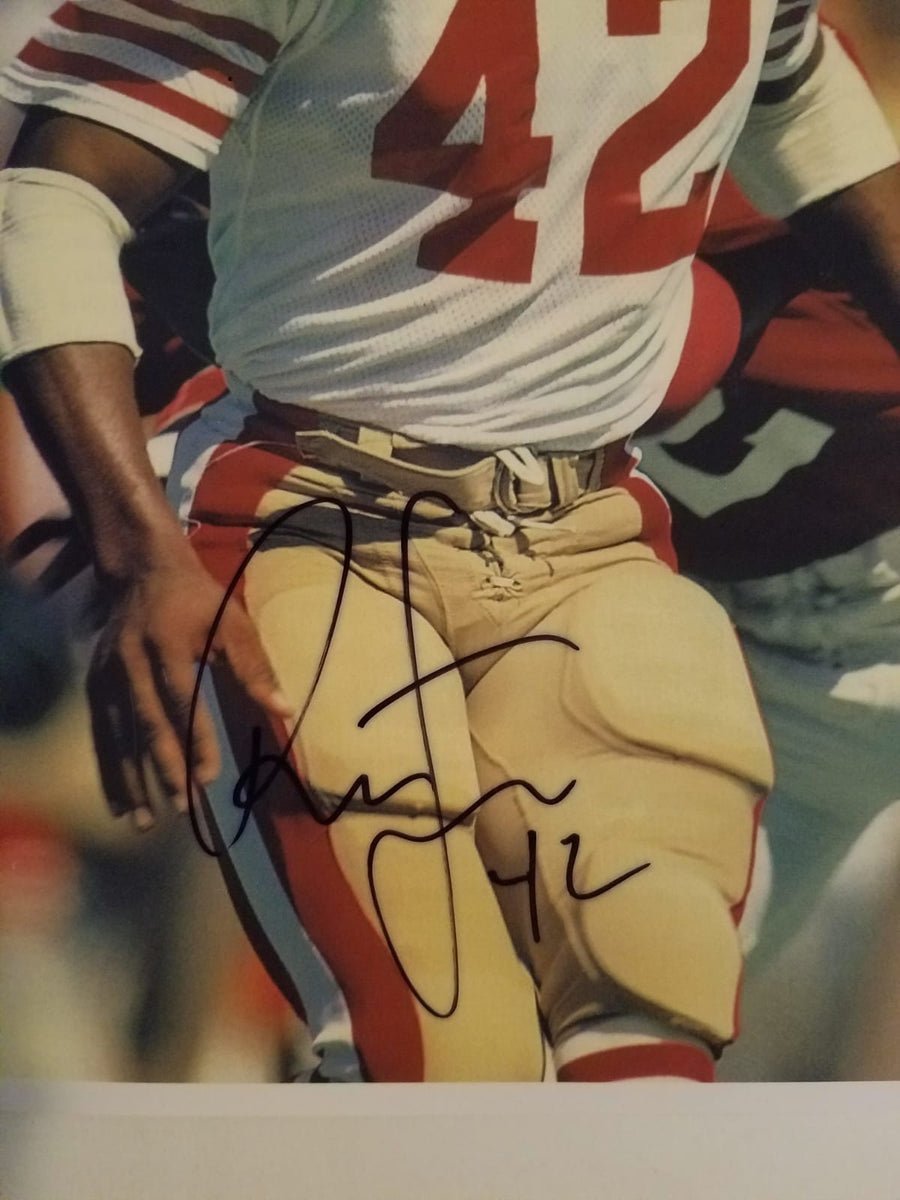 Ronnie Lott San Francisco 49ers 8x10 signed with proof – Awesome Artifacts